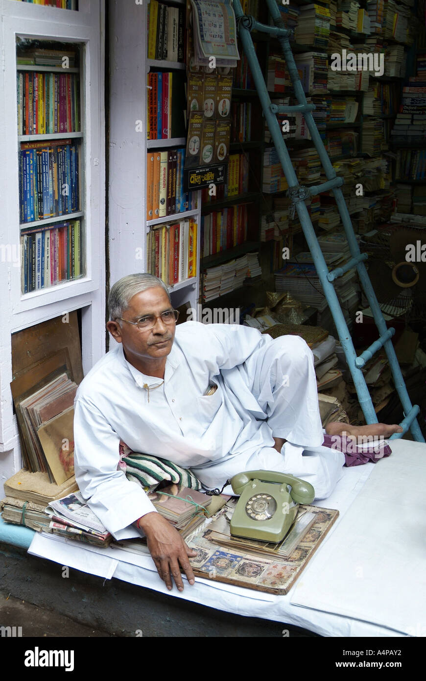 Shopkeeper at a bookstore in Chandni Chowk in Delhi India Stock Photo ...