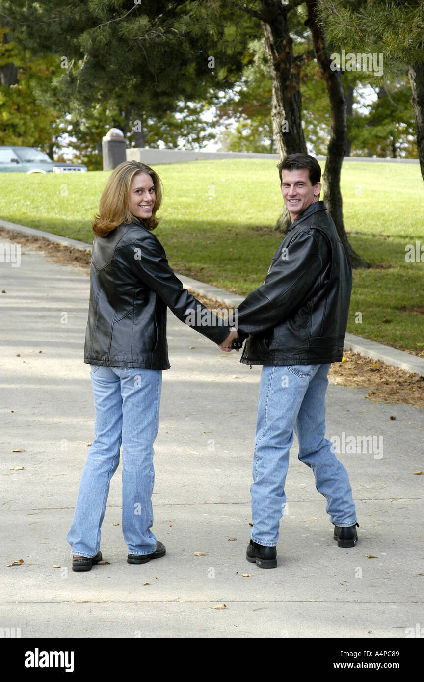 Young adult male and female couple in a loving passionate relationship ...