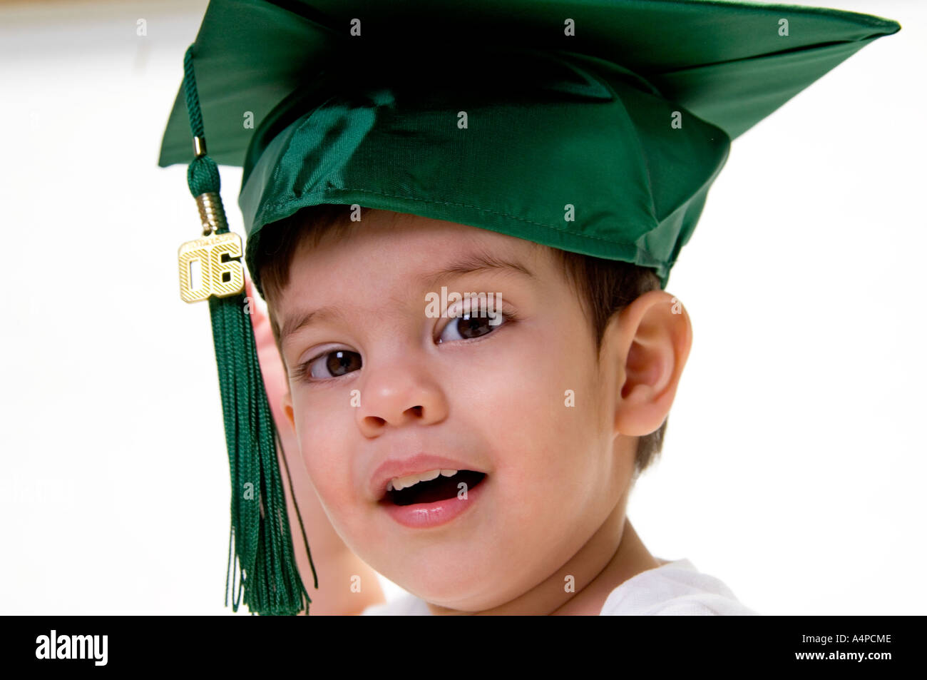 Latino child green hat hi-res stock photography and images - Alamy