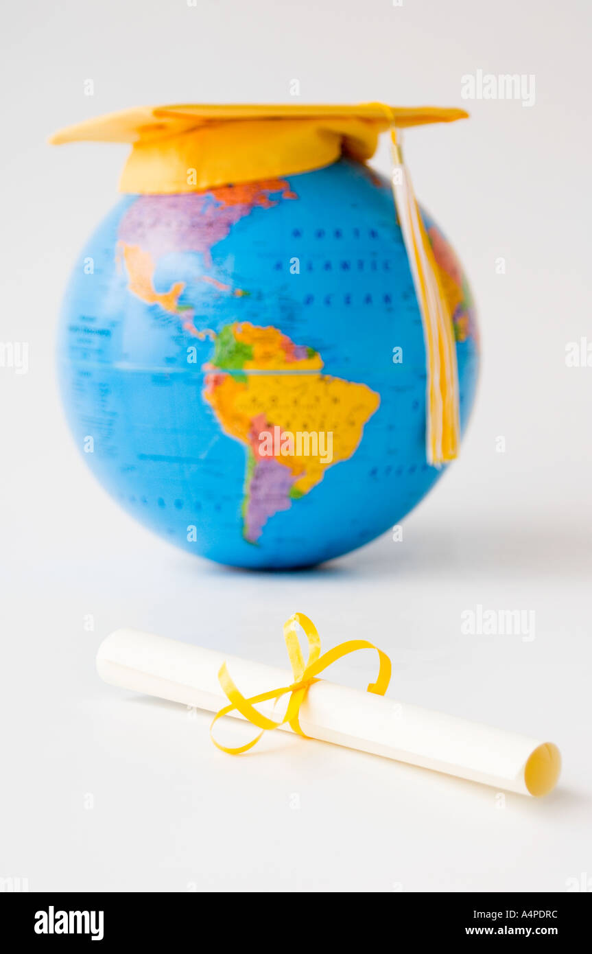 World globe diploma cap and tassel Stock Photo - Alamy