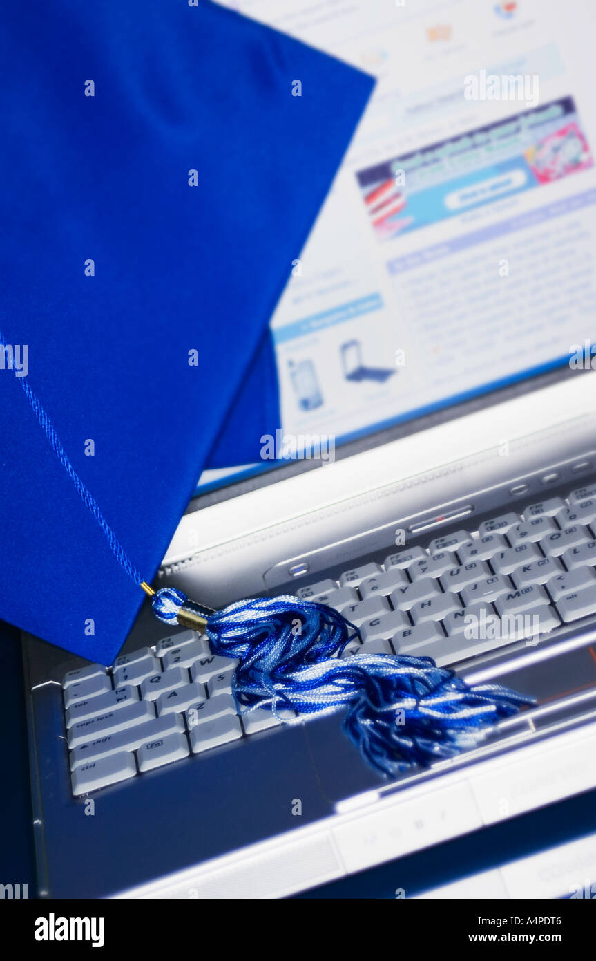 Graduation cap and tassel setting on laptop computer Stock Photo - Alamy