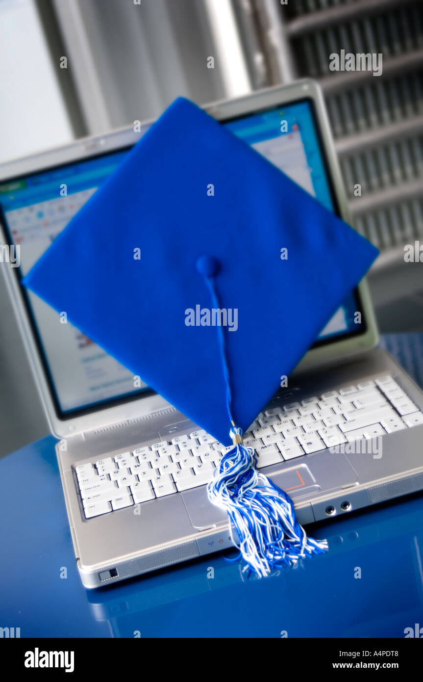 Graduation cap and tassel setting on laptop computer Stock Photo - Alamy