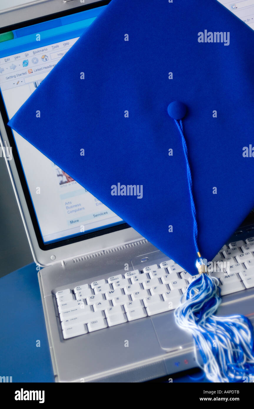 Graduation cap and tassel setting on laptop computer Stock Photo - Alamy