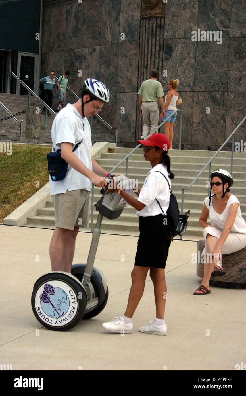 man learning to ride a Segway in downtown Chicago Stock Photo - Alamy