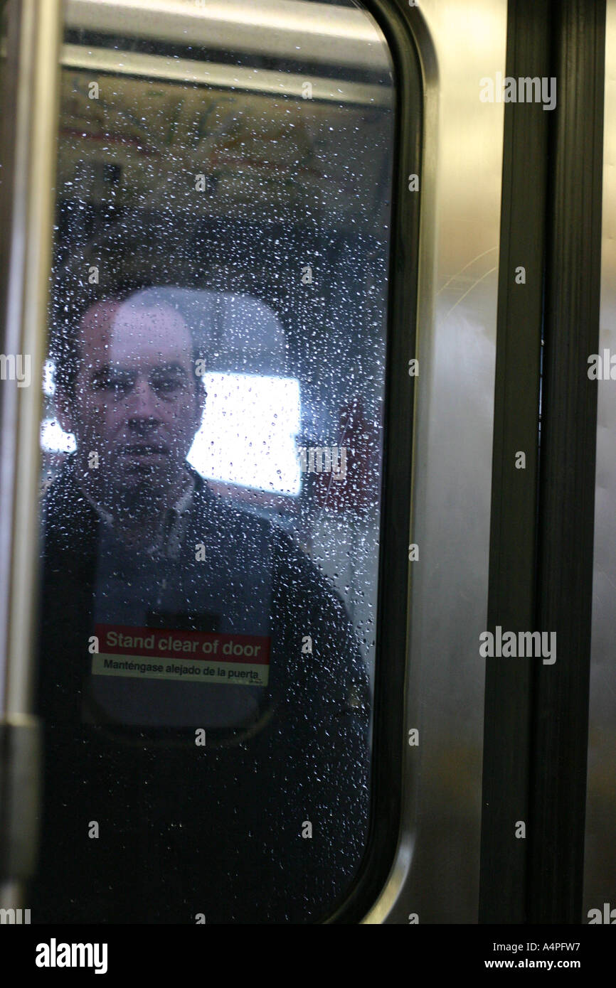 Man standing in front of a closed door hi-res stock photography and ...