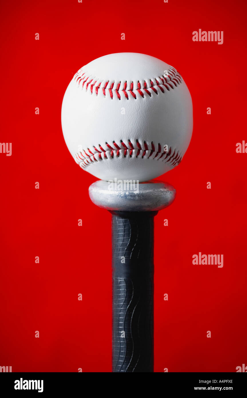 Baseball on top of bat Stock Photo - Alamy