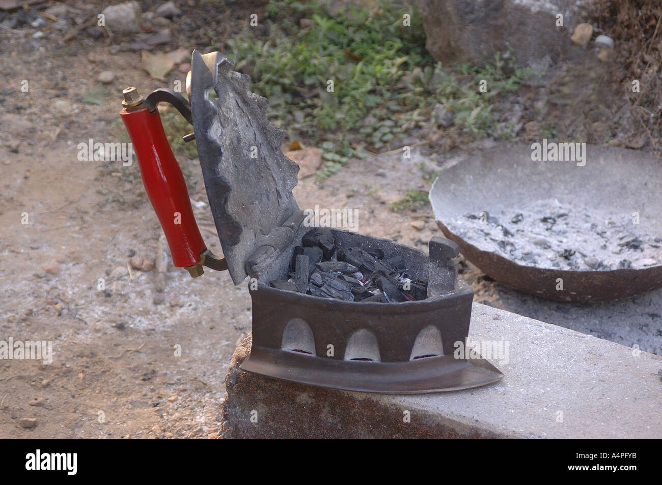 ANG77686 Iron traditional heating with coal used for smoothing clothes ...