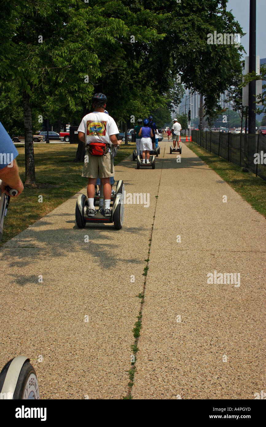 People riding Segway personal transporters through Grant Park Chicago ...