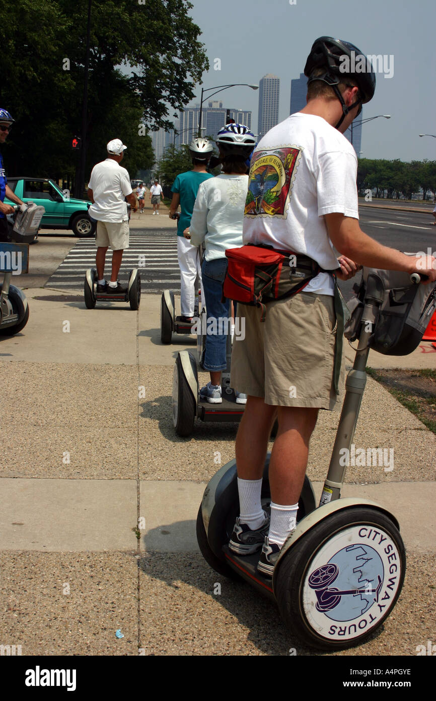 People riding Segway personal transporters through Grant Park Chicago ...