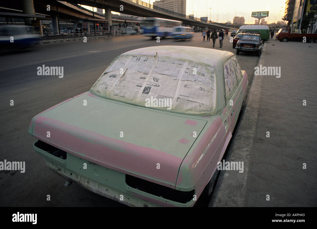 Car ready to be painted Cairo. Weird colors Stock Photo - Alamy