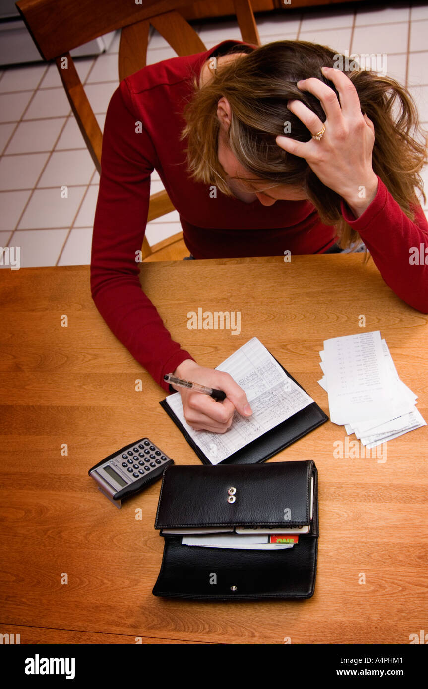 Balancing check book hi-res stock photography and images - Alamy