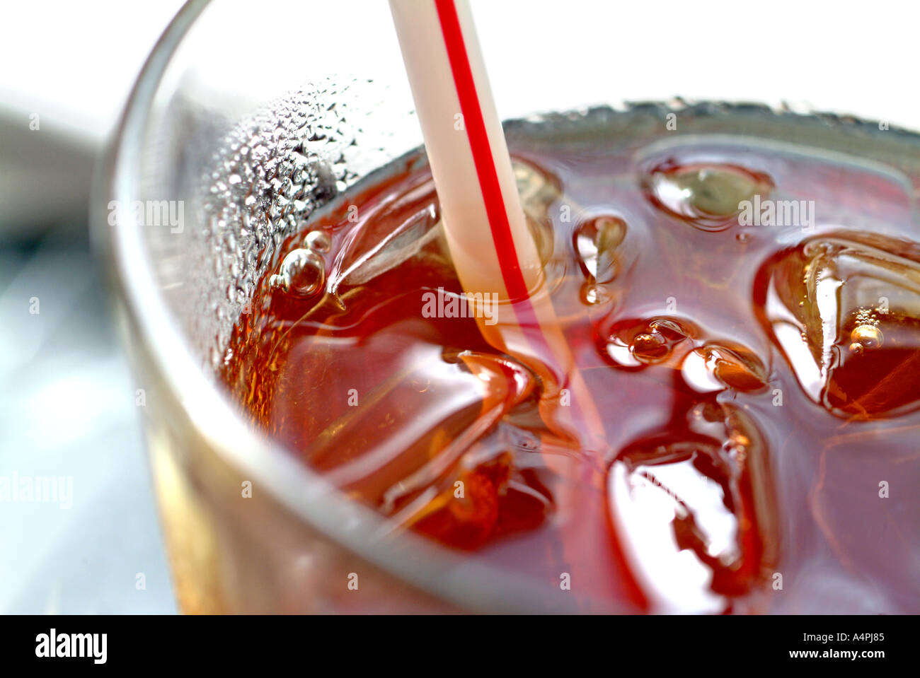 Cold drink in glass with ice Stock Photo - Alamy