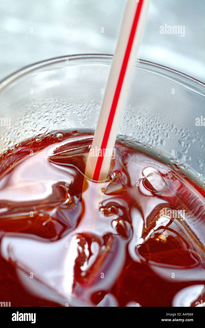 Cold drink in glass with ice Stock Photo - Alamy