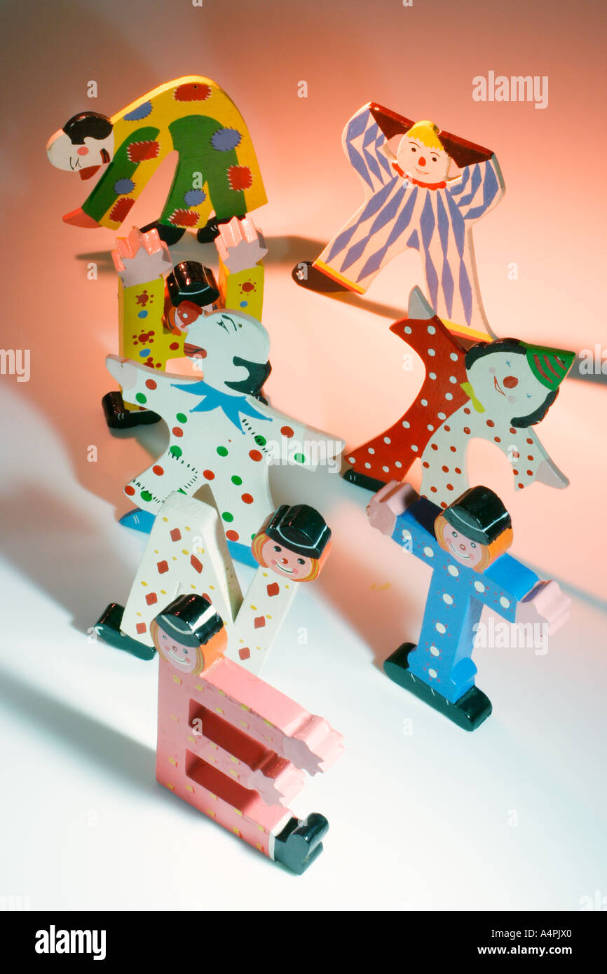 Wooden Clown Figurines and Alphabets Stock Photo - Alamy