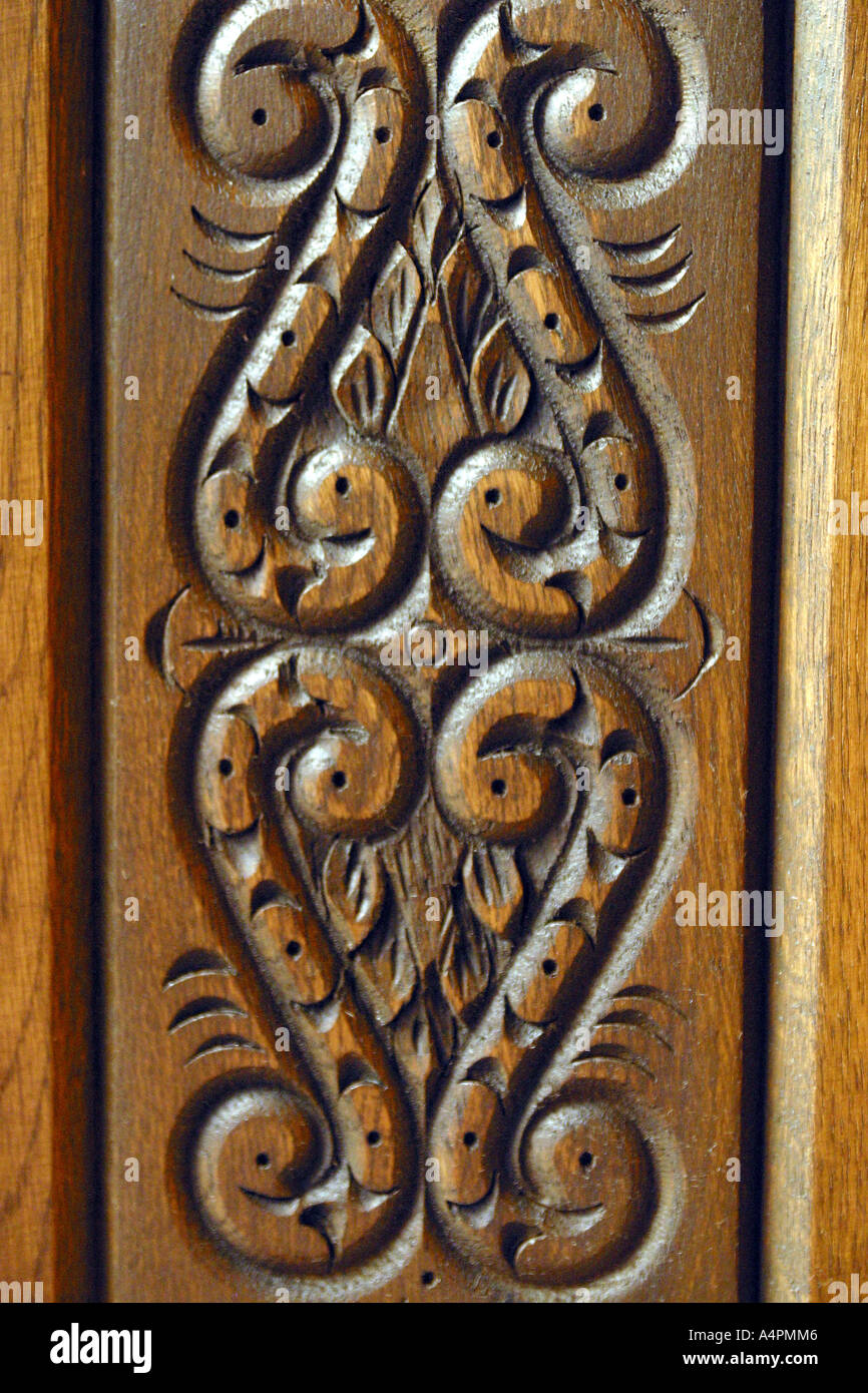 handcrafted ornate engraving on a piece of antique furniture Stock ...