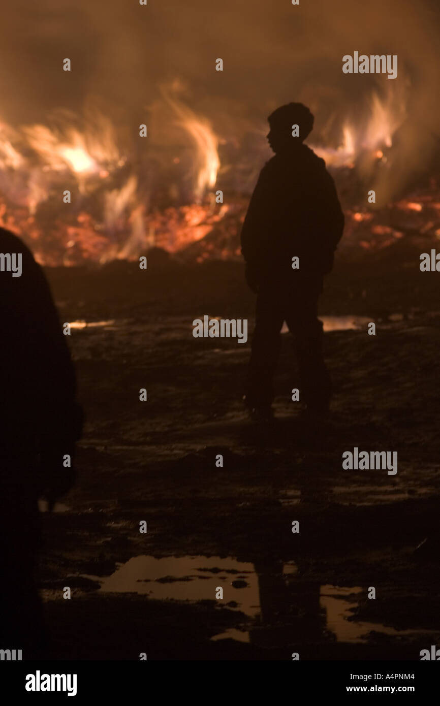 Silhouette standing near fire hi-res stock photography and images - Alamy