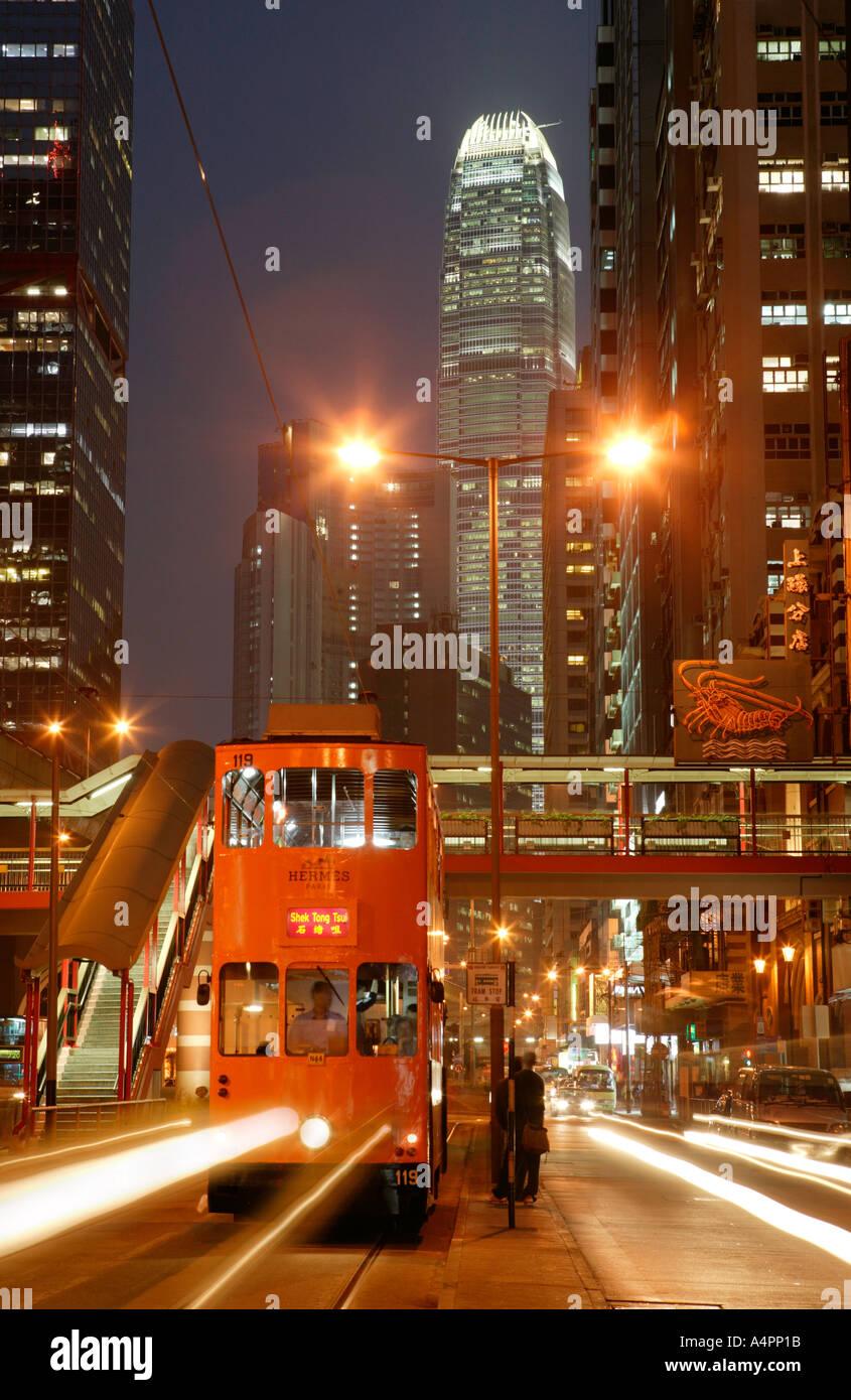 Tallest building in Hong Kong ifc tower with traffic at night and old ...