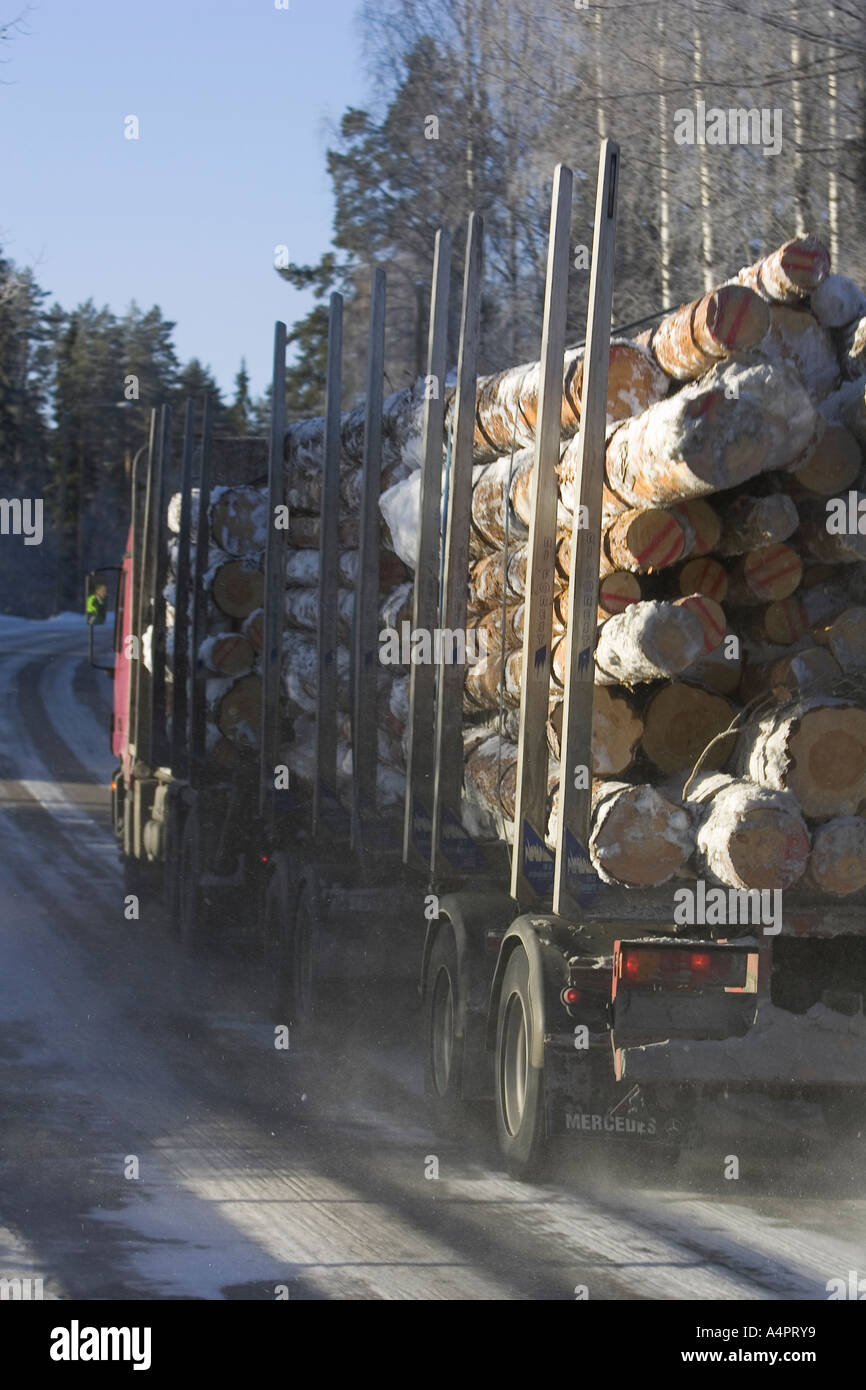 Truck carrying logs Stock Photo - Alamy