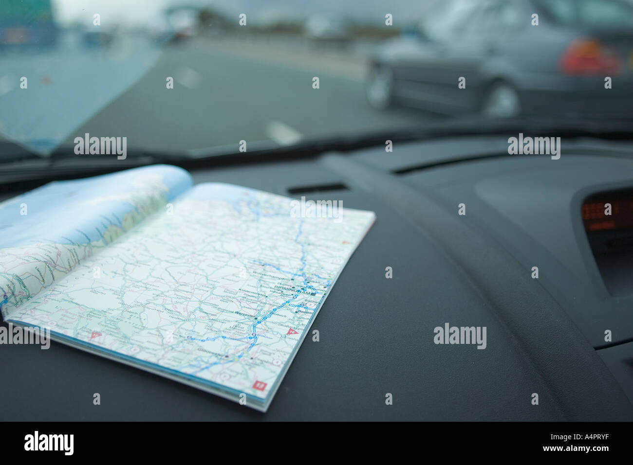 Road map on the dashboard of a car Stock Photo - Alamy