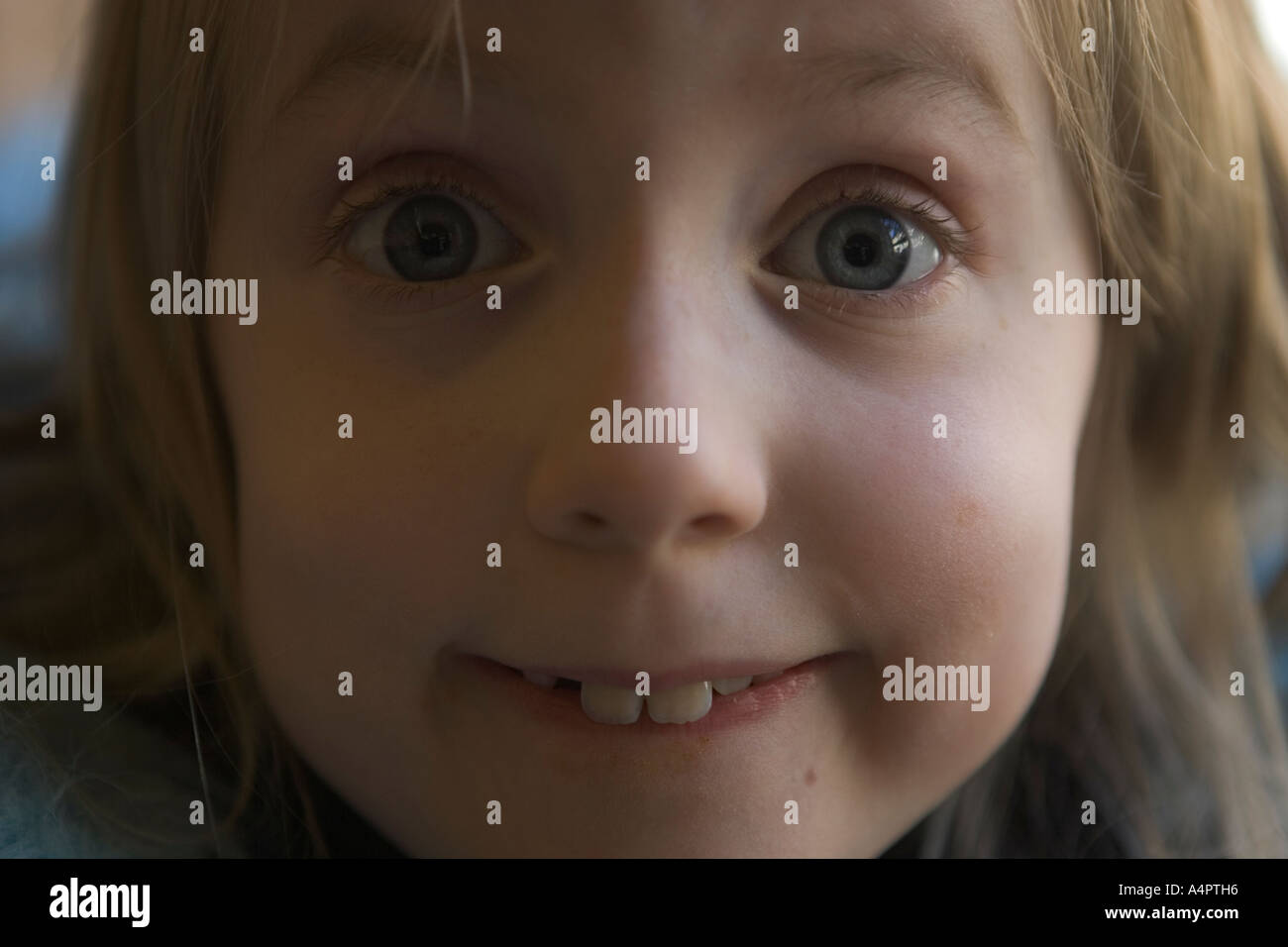 Portrait of a girl making a face Stock Photo - Alamy