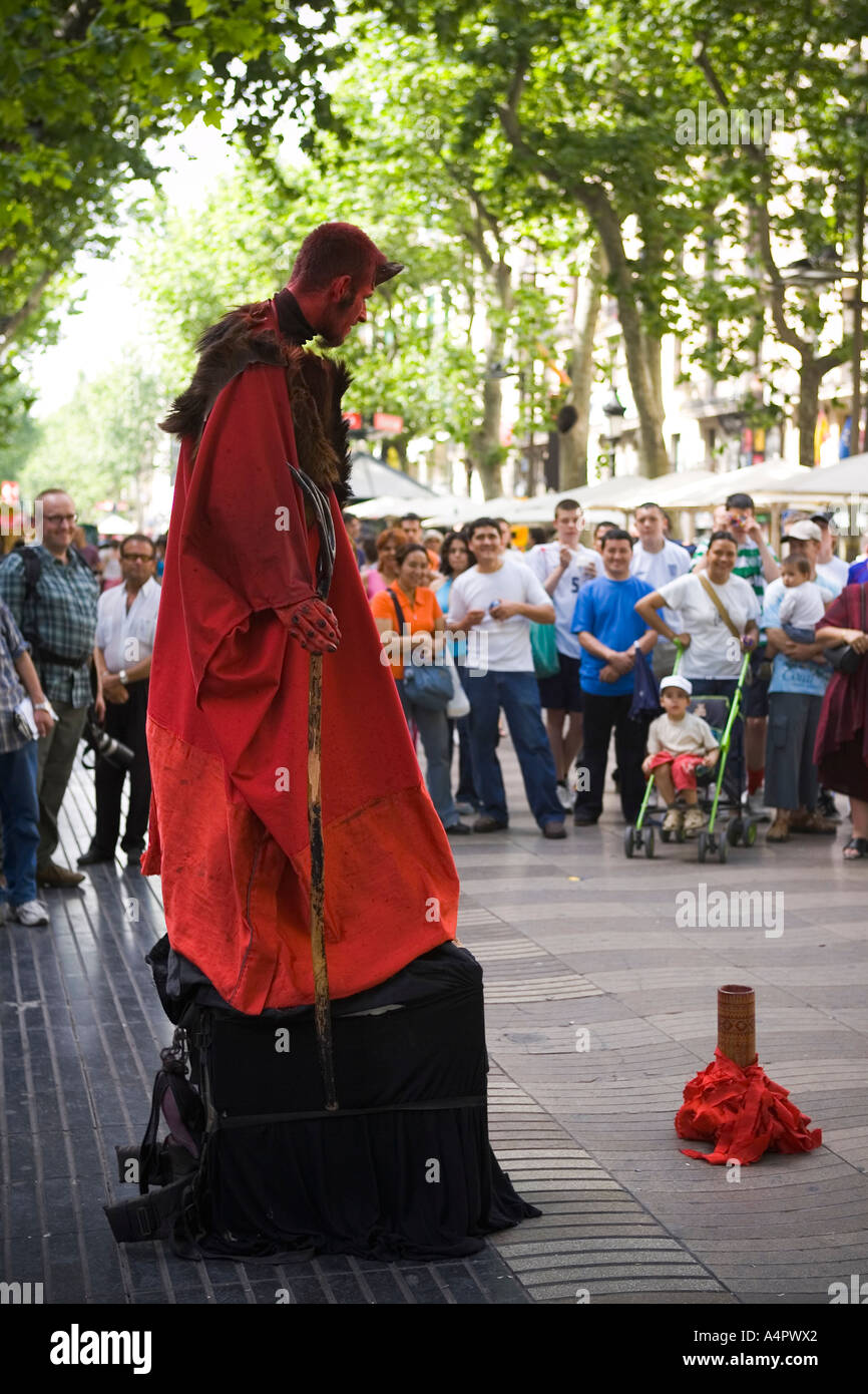 Side profile of a street magician Stock Photo - Alamy