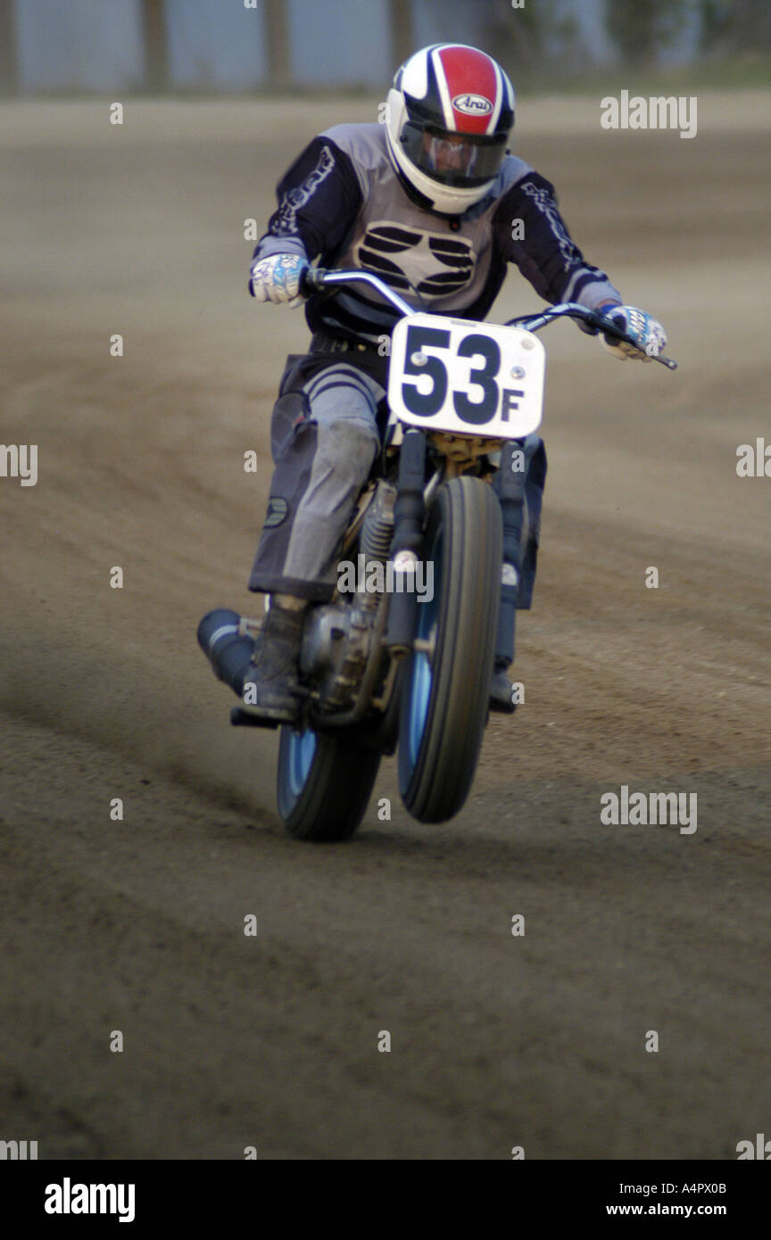 53 racer pulls wheelie during dirt track motorcycle race Croswell ...