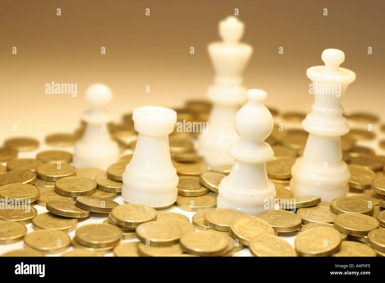 Coins and Chess Pieces Stock Photo - Alamy