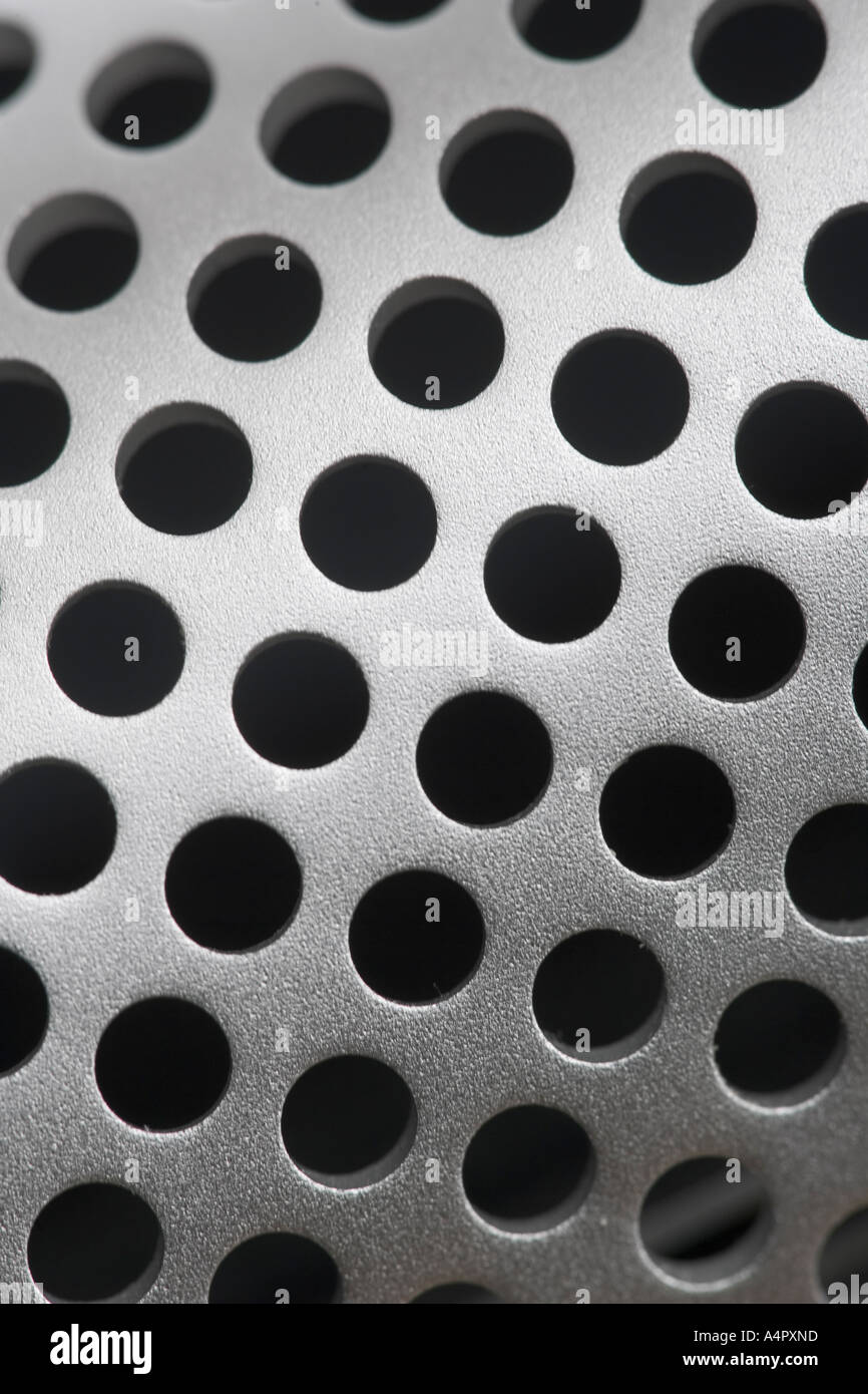 Perforated metal surface hi-res stock photography and images - Alamy