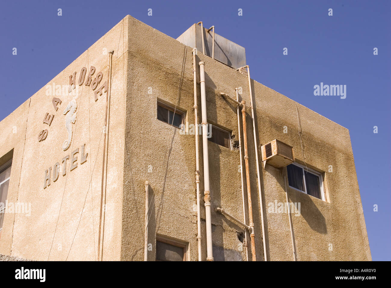 High section view of a hotel building Stock Photo - Alamy