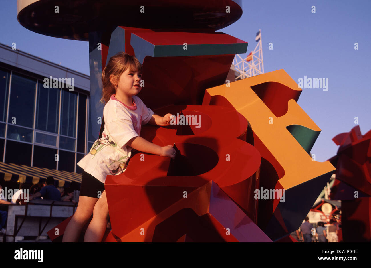 chicago, girl play on top of letters Stock Photo - Alamy