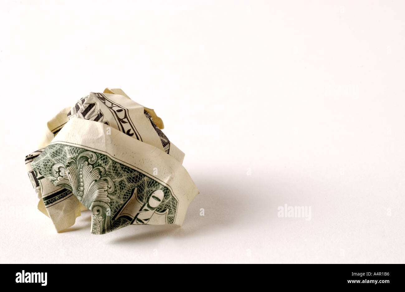 Dollar bill wadded up hi-res stock photography and images - Alamy