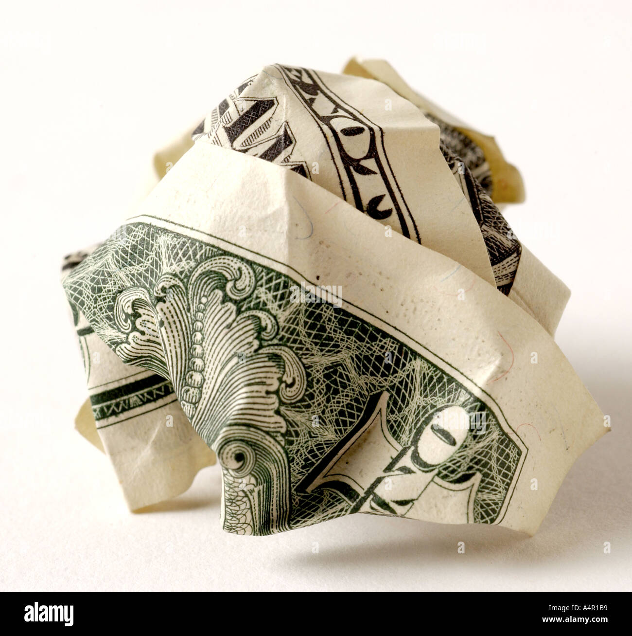 Color image of a dollar bill wadded up like a piece of trash Stock ...