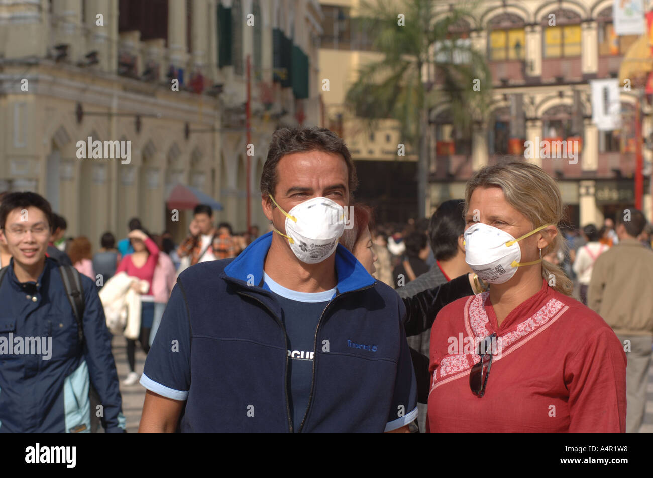 tourists wearing pollution mask in the street Stock Photo - Alamy