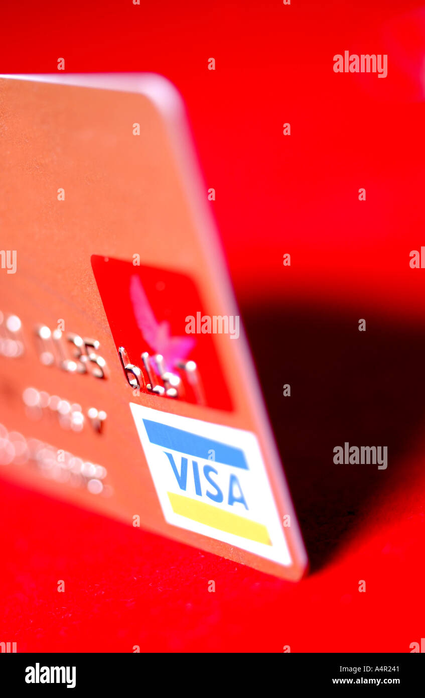 Color image of a Visa credit card against a red background Stock Photo ...