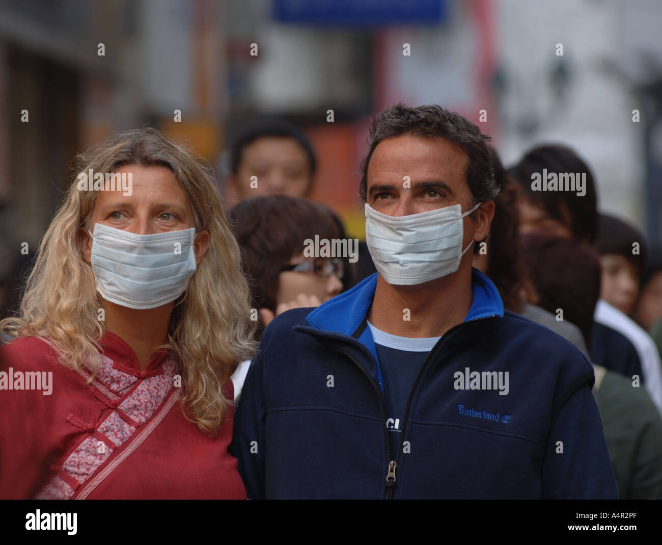 tourists wearing pollution mask in the street Stock Photo - Alamy