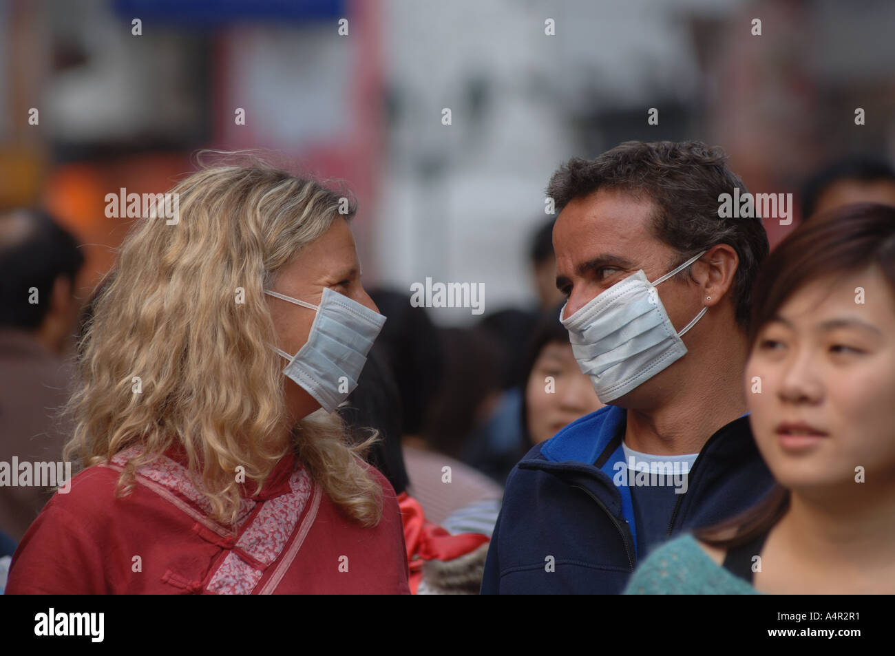 tourists wearing pollution mask in the street Stock Photo - Alamy