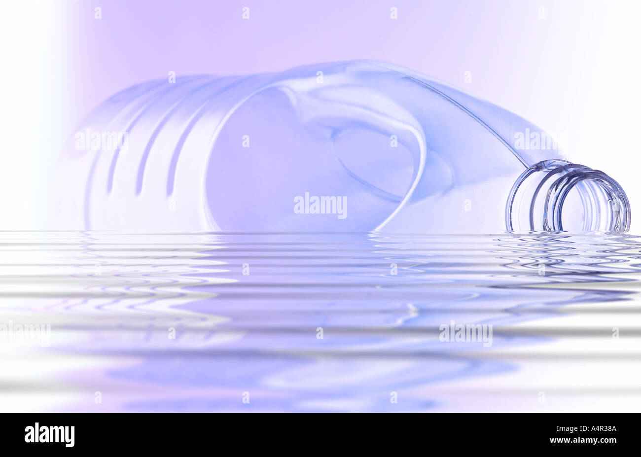 plastic bottle floating in water Stock Photo - Alamy