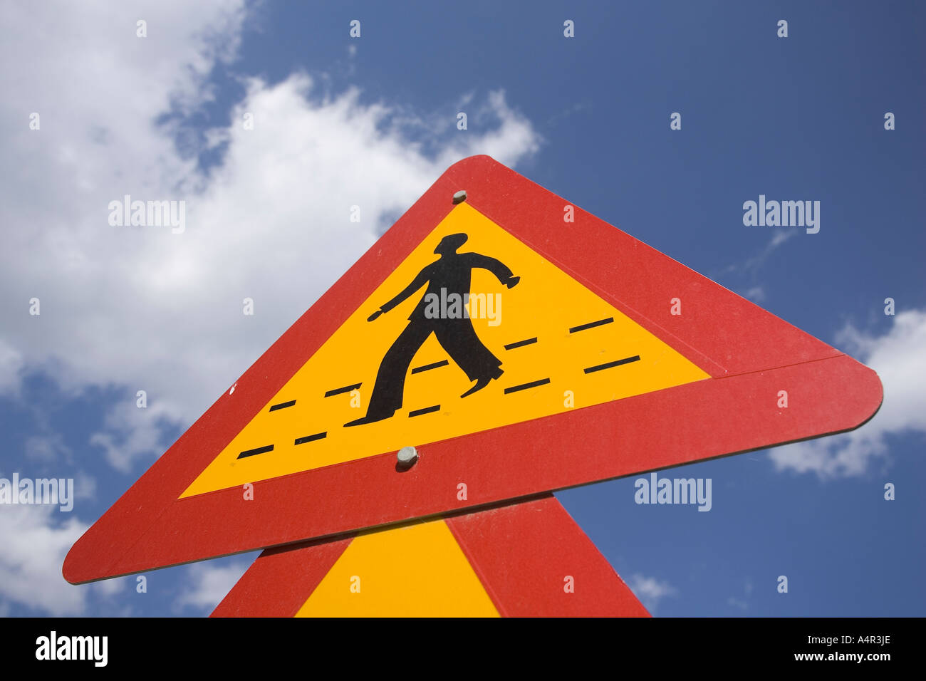 Low angle view of a pedestrian crossing sign board Stock Photo - Alamy