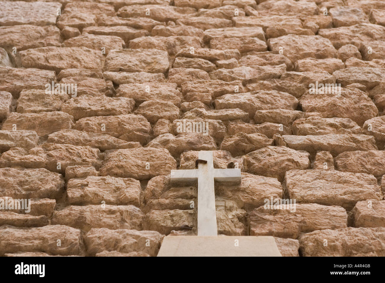 Low angle view of a cross on a tombstone Stock Photo - Alamy