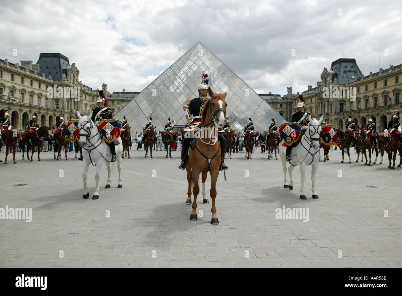French Republican guards on show in front of the Louvre museum in Paris ...