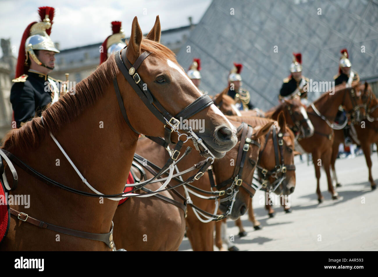 French Republican guards on show in front of the Louvre museum in Paris ...