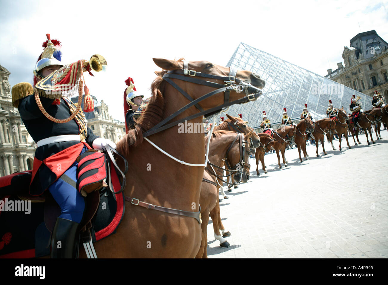 French Republican guards on show in front of the Louvre museum in Paris ...
