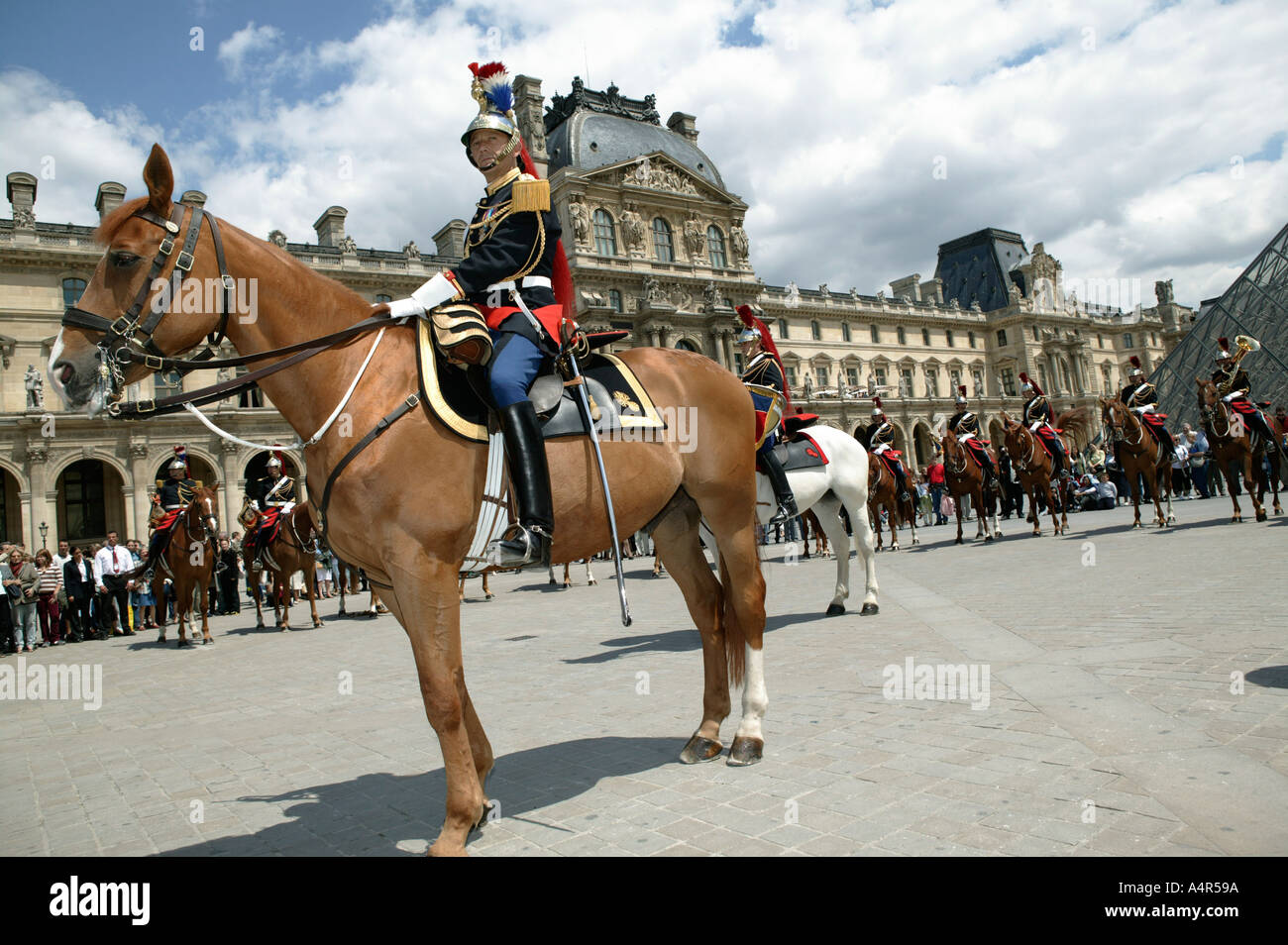 French Republican guards on show in front of the Louvre museum in Paris ...