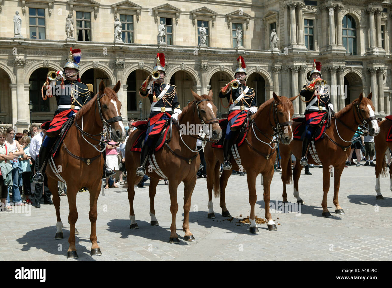 French Republican guards on show in front of the Louvre museum in Paris ...
