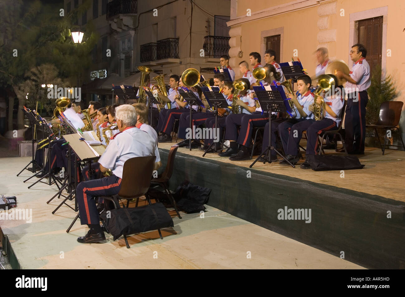 Musicians performing on a stage Stock Photo - Alamy
