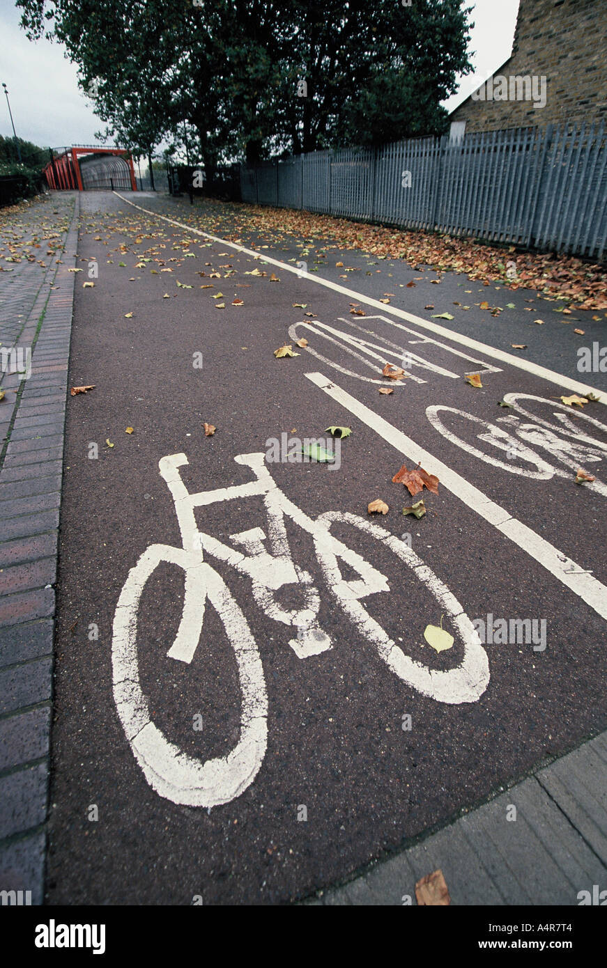 Cycle path markings and pedestrian bridge Stock Photo - Alamy