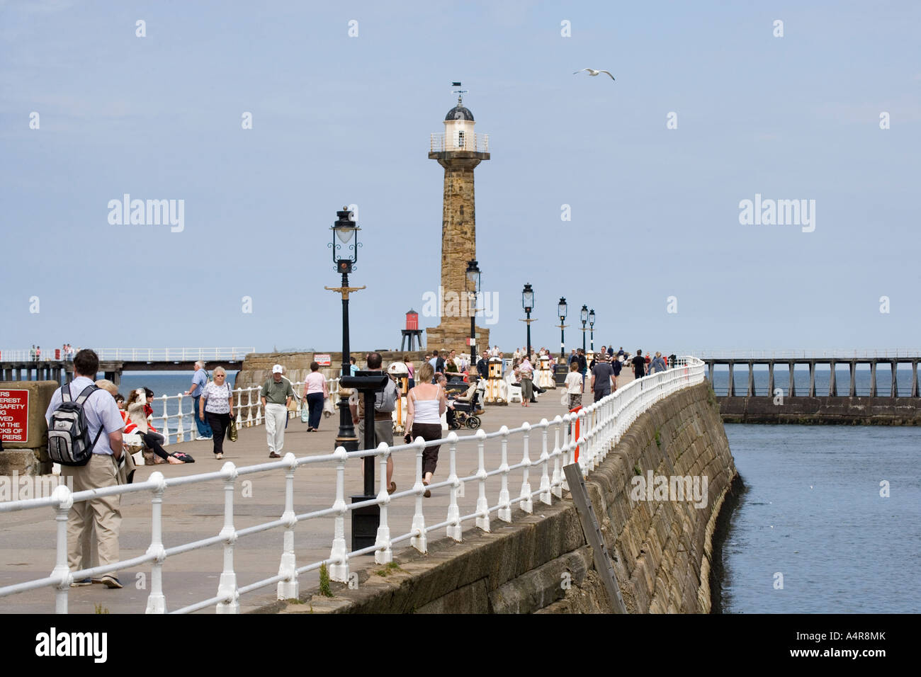 Whitby pier and lighthouse North Yorkshire England UK Stock Photo - Alamy