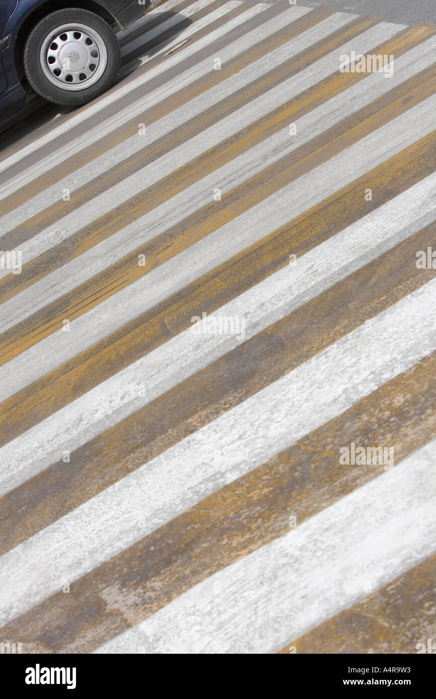 Car at a zebra crossing Stock Photo - Alamy