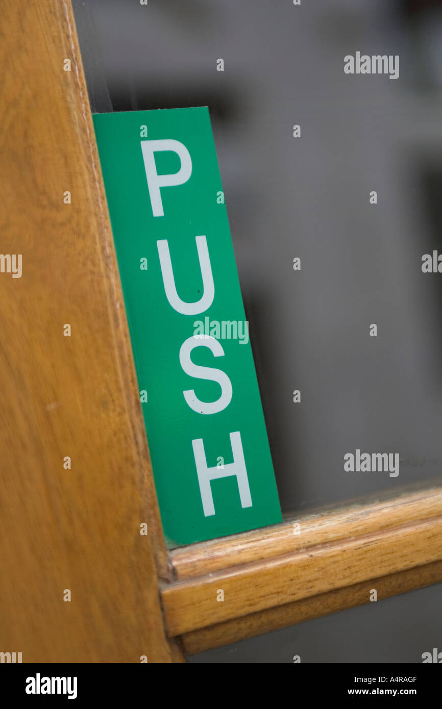 Push sign on a door Stock Photo - Alamy