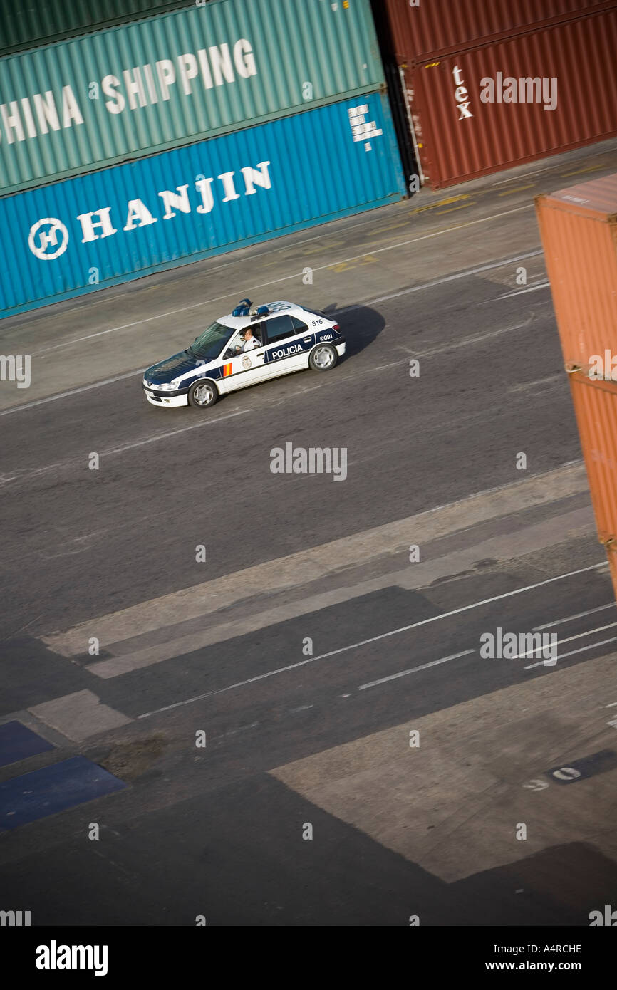 High angle view of a police car near cargo containers Stock Photo - Alamy